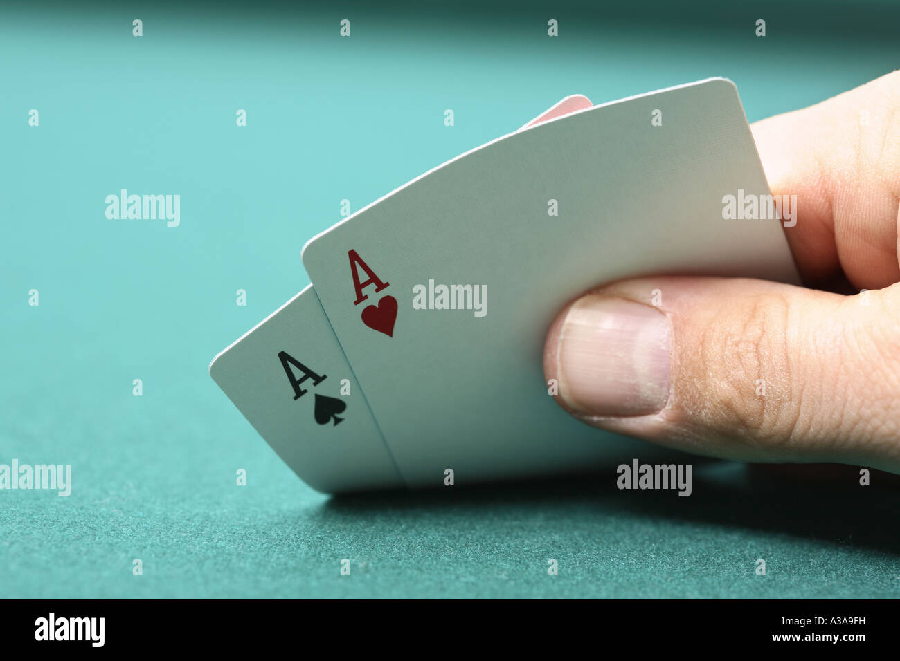 Two Aces in Hand Stock Photo - Alamy