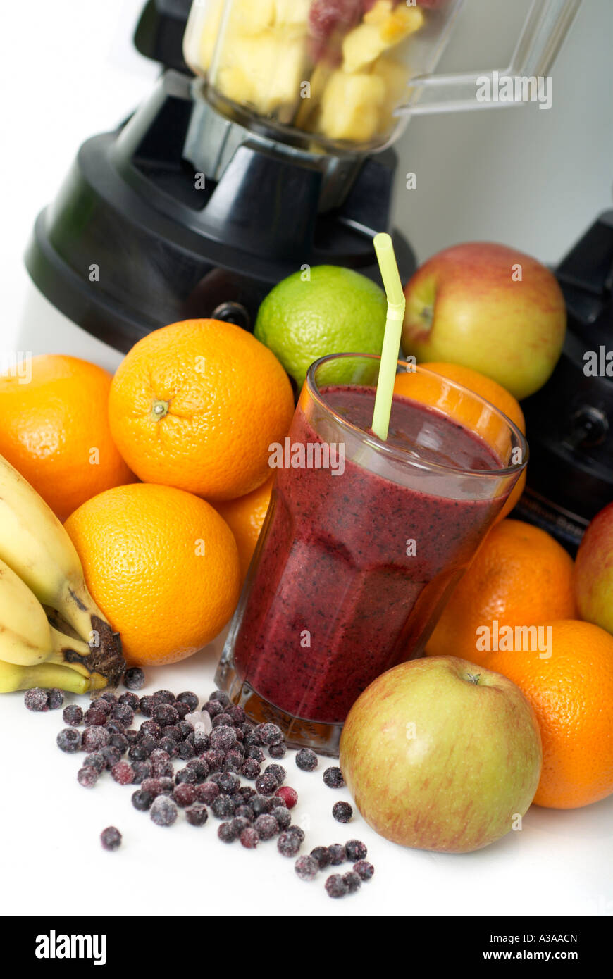 Fresh fruit and blenders for making smoothies and juices, with smoothie ...