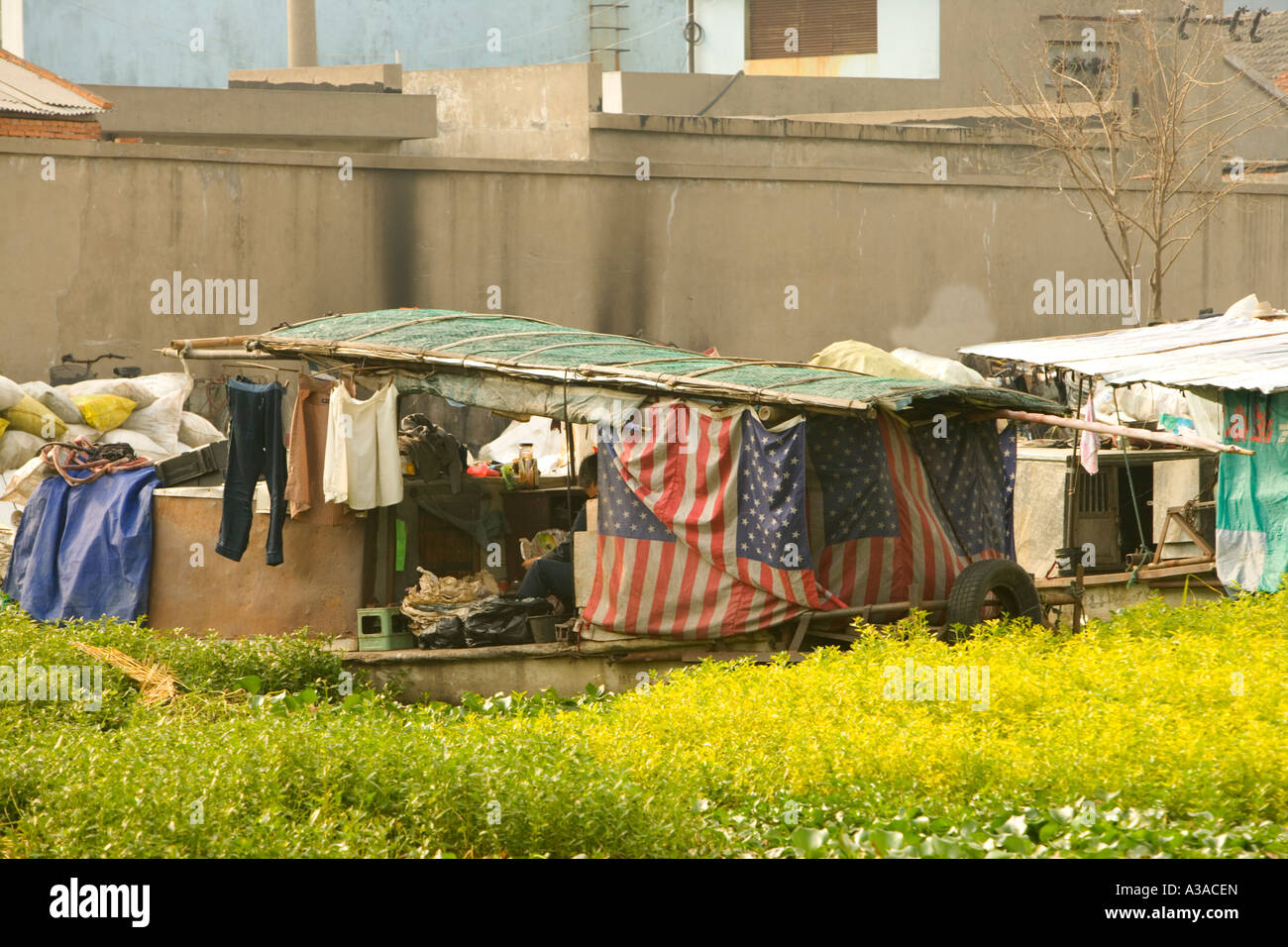 Squatters home using the American Flag, China Stock Photo - Alamy