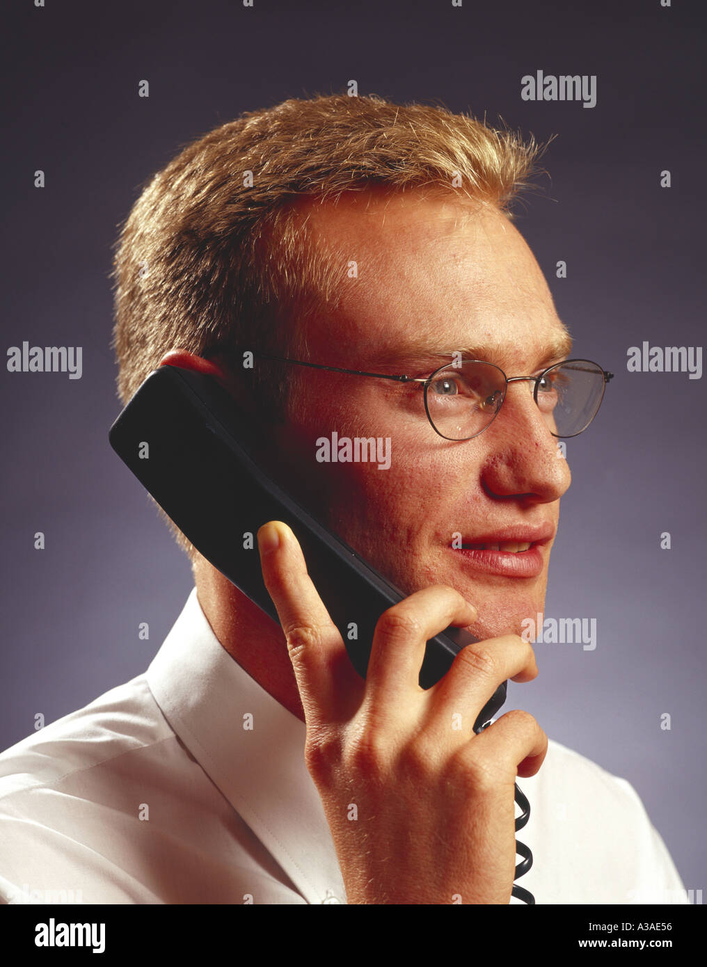 Manager on phone Stock Photo - Alamy