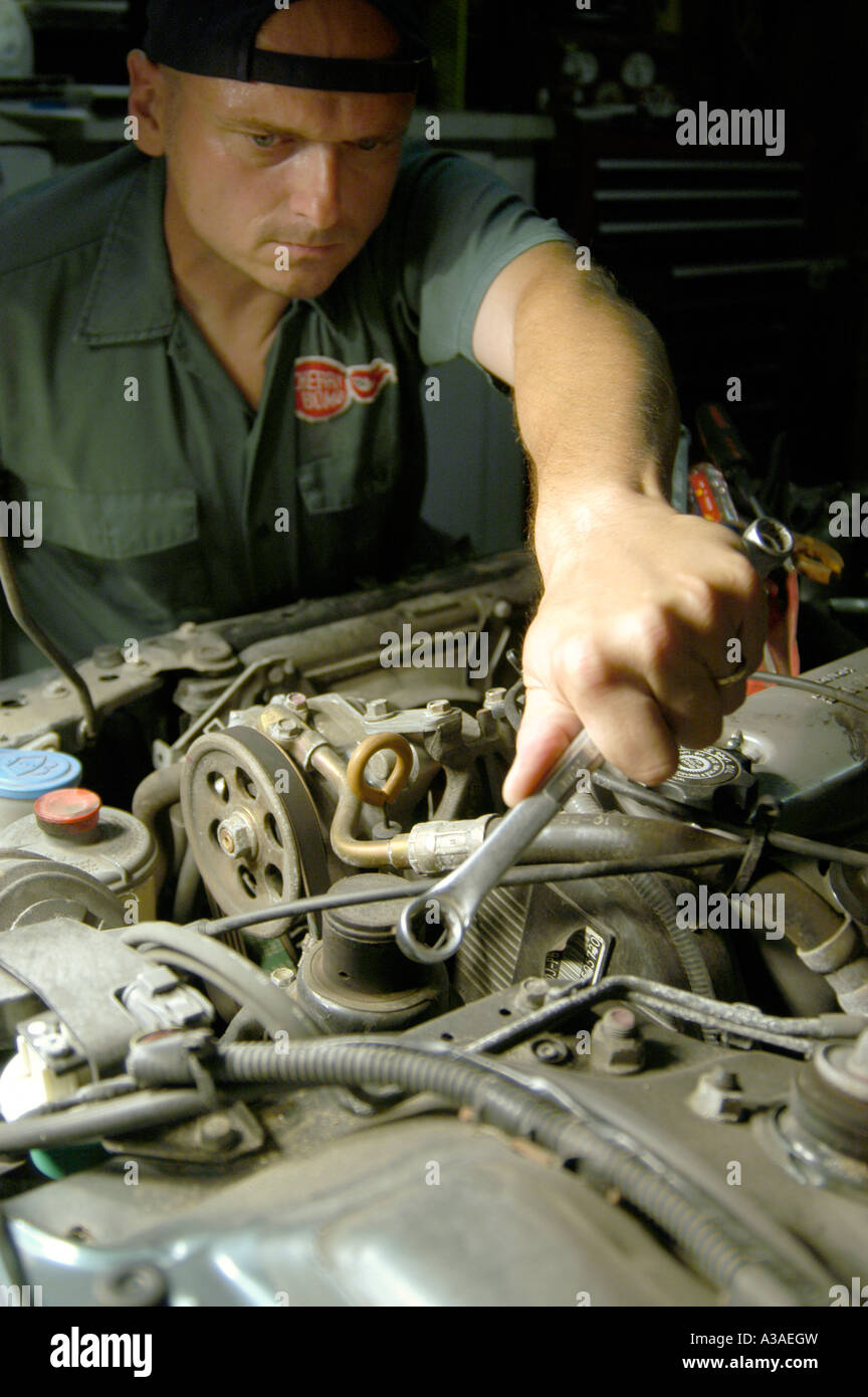 Mechanic Using Wrench Stock Photo - Alamy