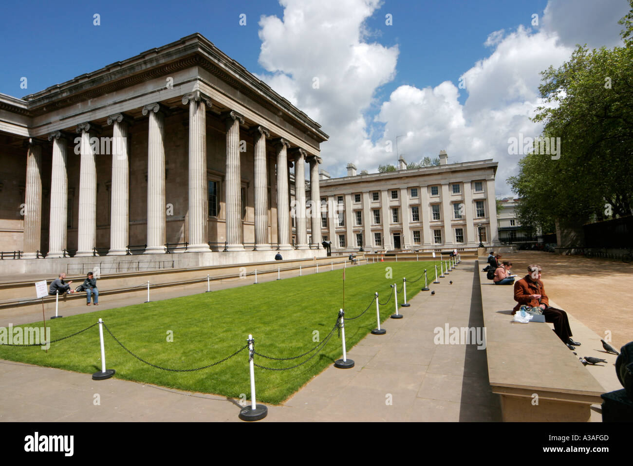 Visitors enjoy a quiet break outside the British Museum in Bloomsbury ...