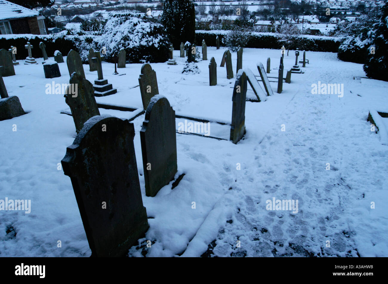 Snow covered graveyard in Hythe Kent England Stock Photo - Alamy