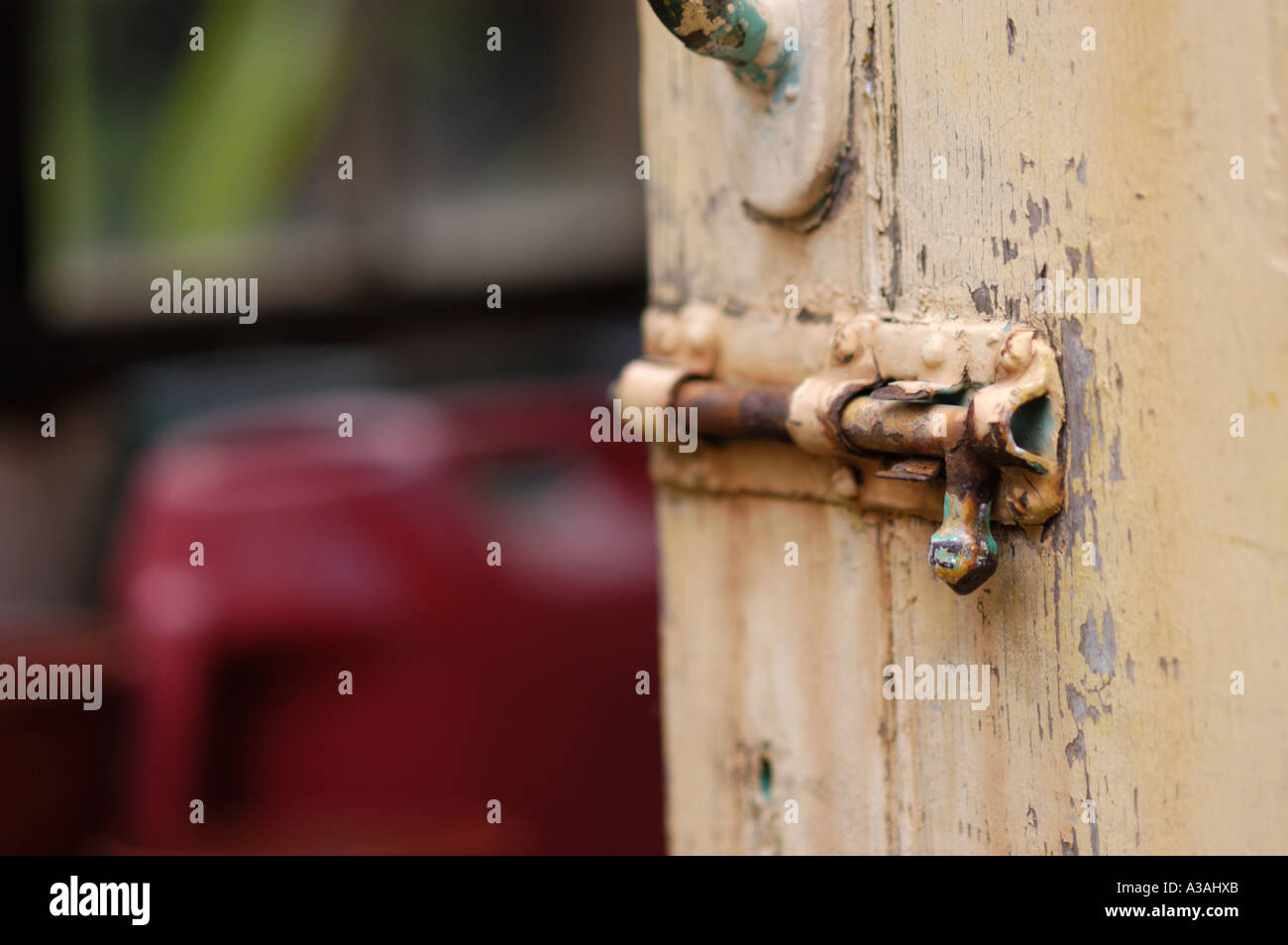 Close up of a an old door with bolt type lock Stock Photo - Alamy