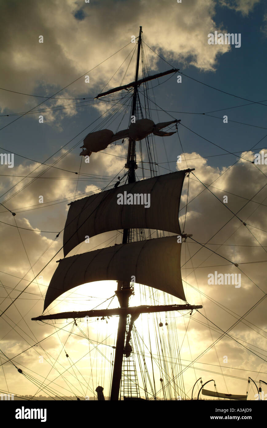 Tall ship at twilight Stock Photo - Alamy