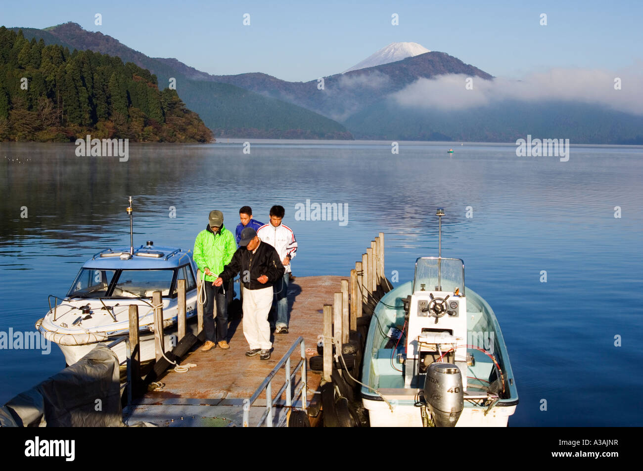 Mt Fuji boats on lake Ashi Ashiko Hakone Kanagawa prefecture Japan Asia ...