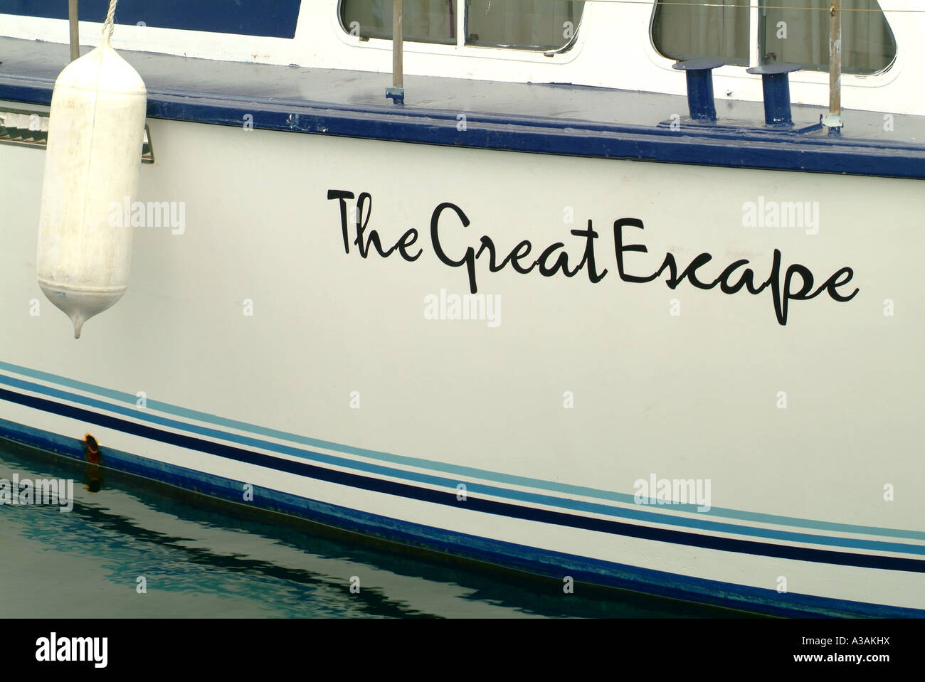 Yacht with The Great Escape written on the side Stock Photo - Alamy