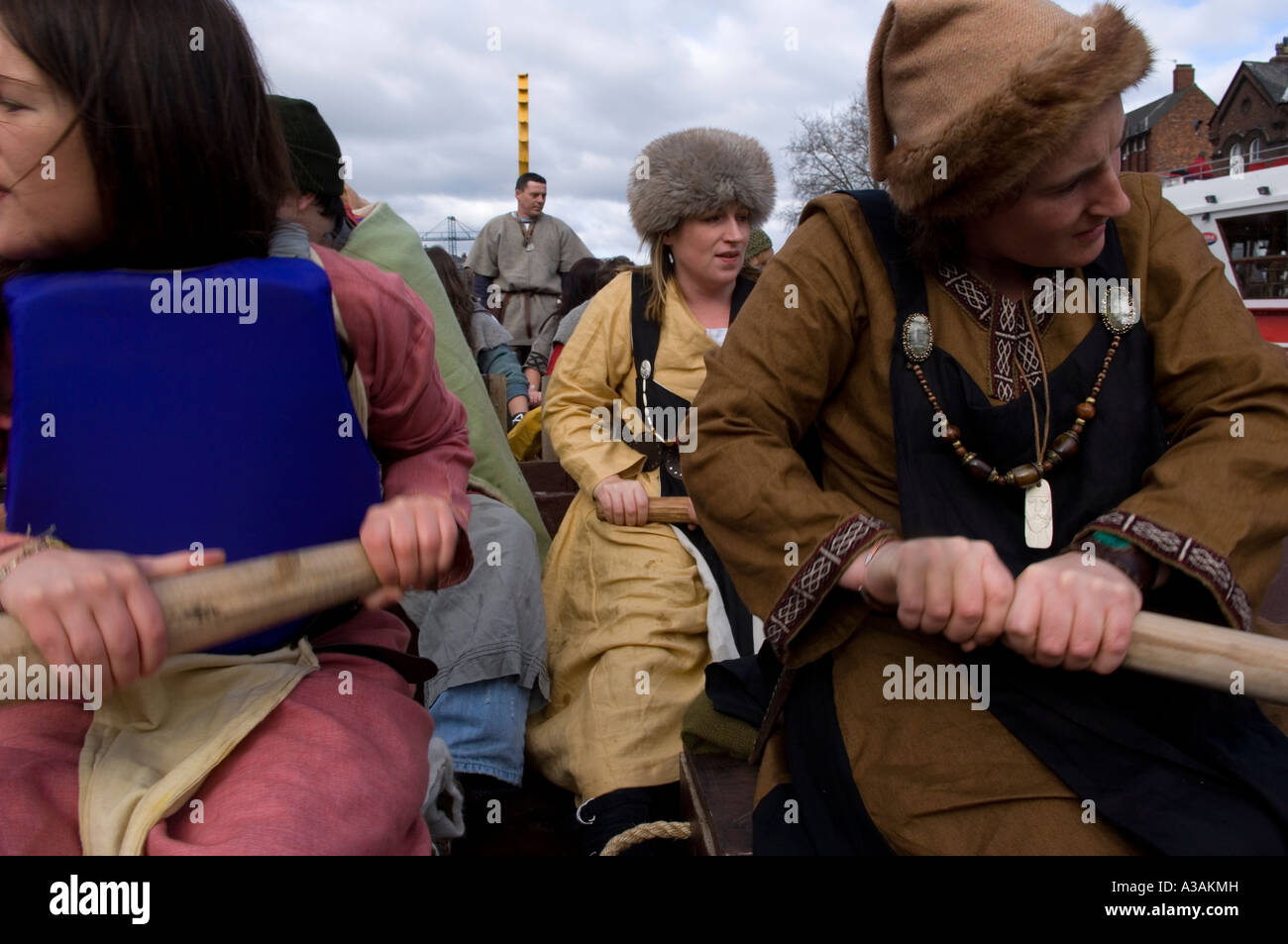 Viking women rowing a longboat at the Jorvik Viking Festival York ...