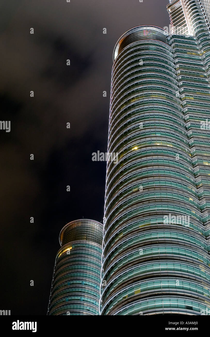 Section of Petronas Towers illuminated at night Stock Photo - Alamy