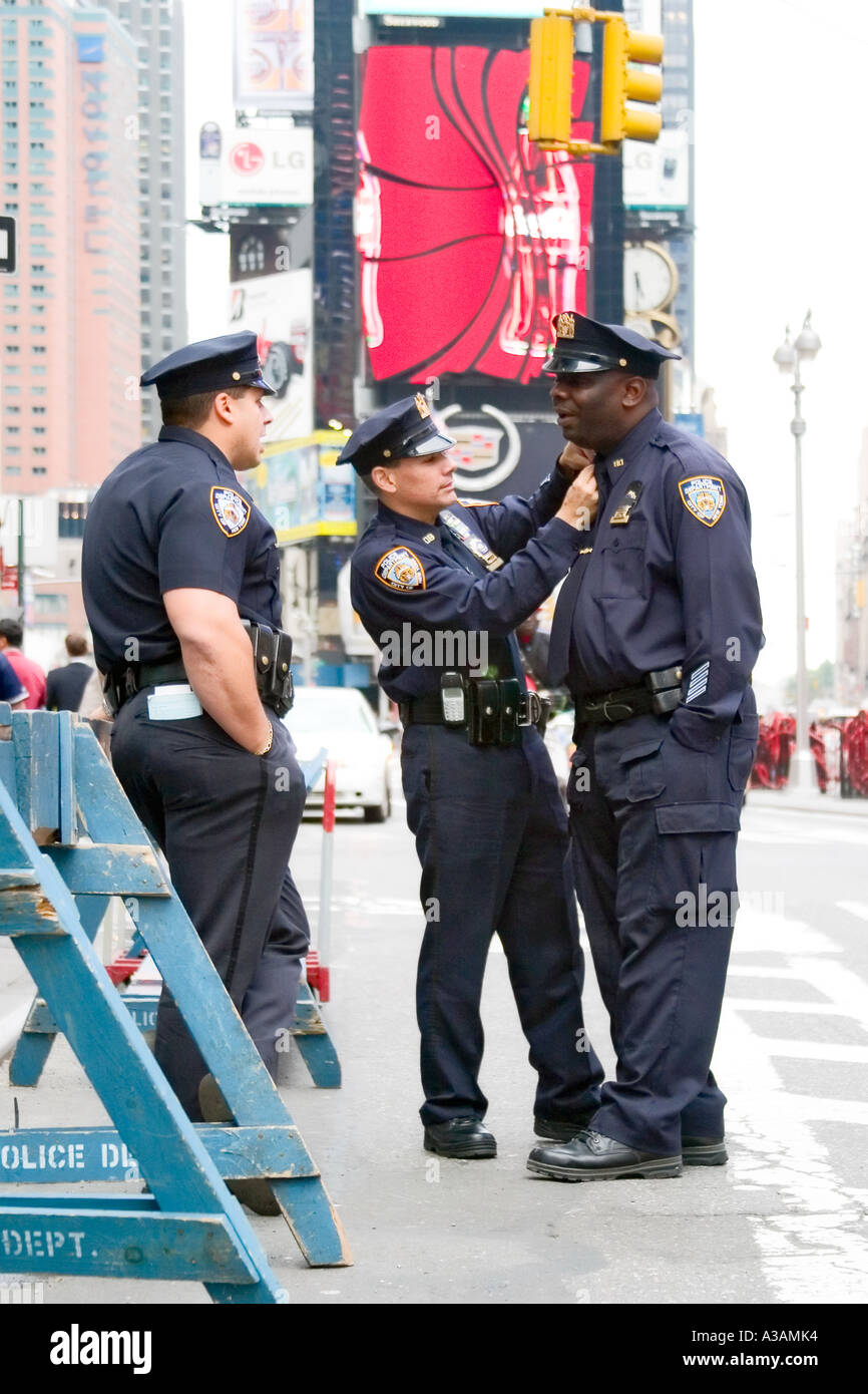 Three Policemen in Times Square New York City Stock Photo - Alamy