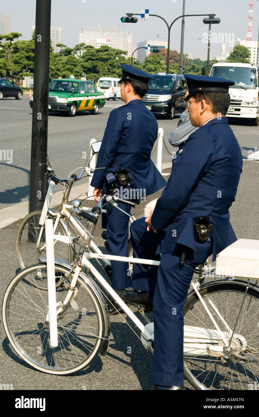 policemen on bicycles Tokyo Japan Asia Stock Photo - Alamy