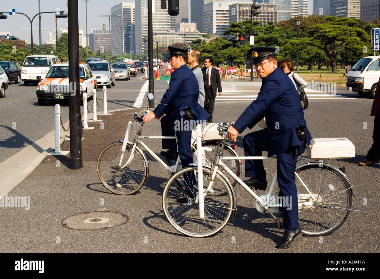 policemen on bicycles Tokyo Japan Asia Stock Photo - Alamy