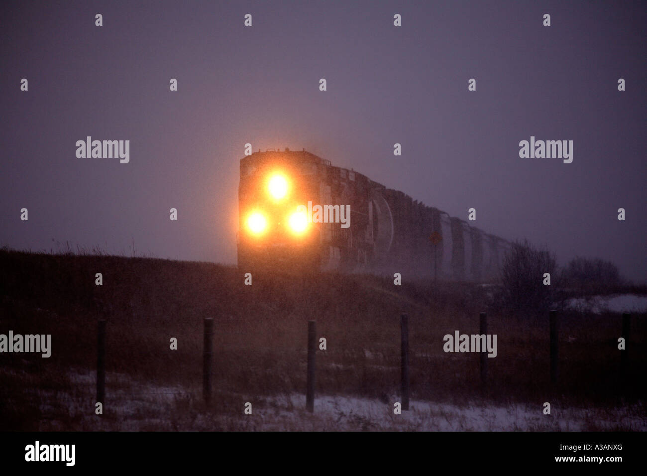 diesel engine train with lights on Stock Photo - Alamy