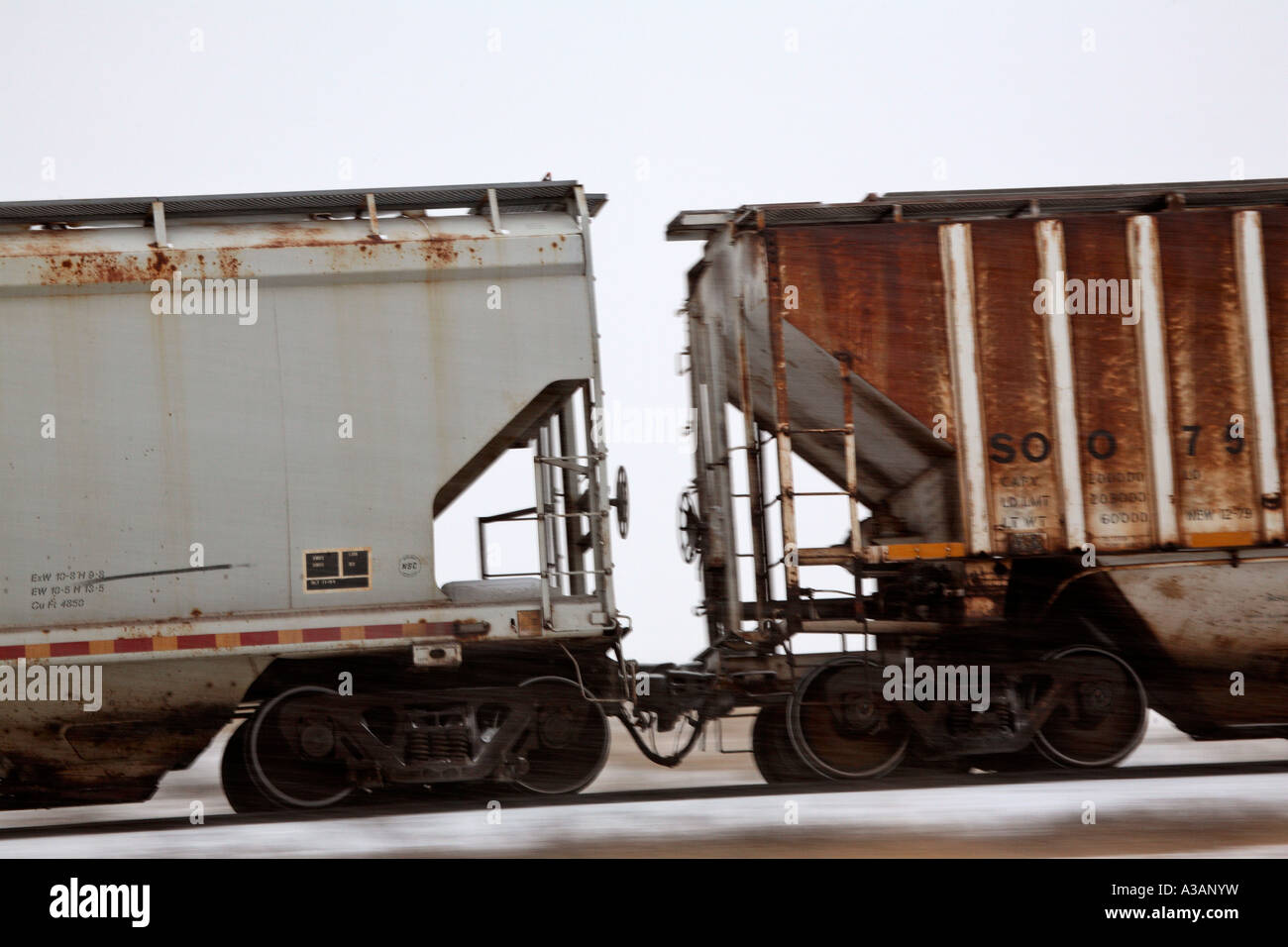 ore rail cars in motion Stock Photo - Alamy