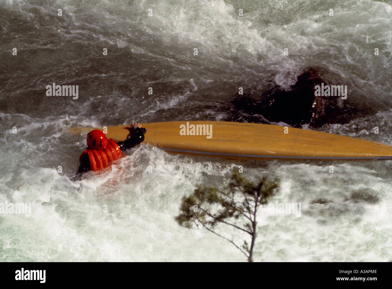 Overturned Kayak and Kayaker in the Rapids of the Thompson River near ...
