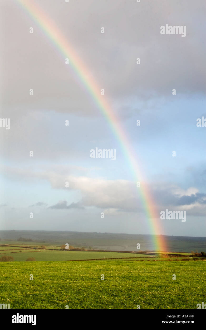 Rainbow over the Dorset countryside Stock Photo - Alamy