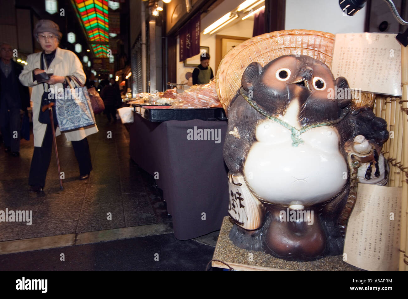 tanuki Japanese racoon Nishikikoji covered street market Kyoto Japan ...