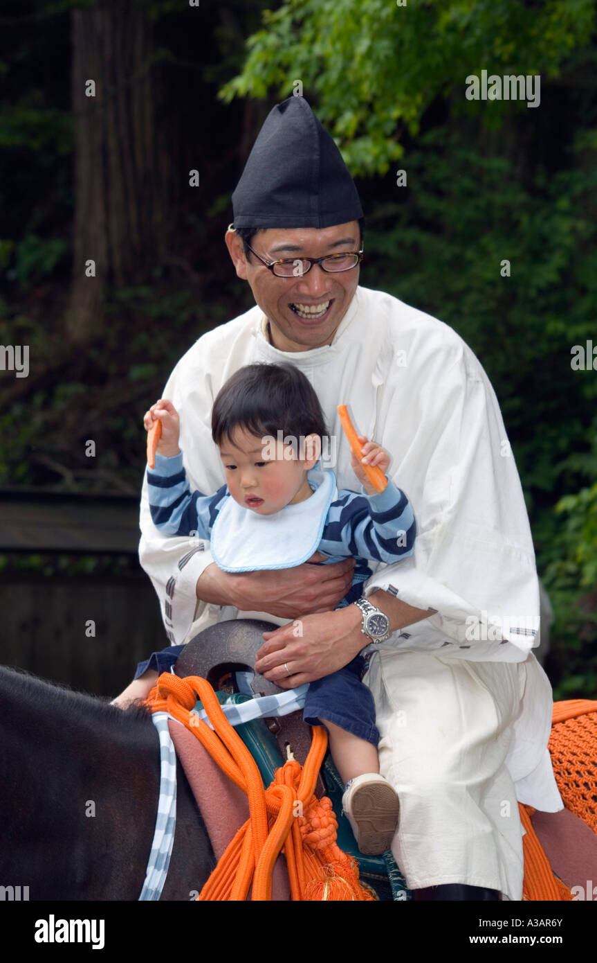 Priest and Baby on Horseback Nikko Spring Festival Toshogu Shrine Nikko ...