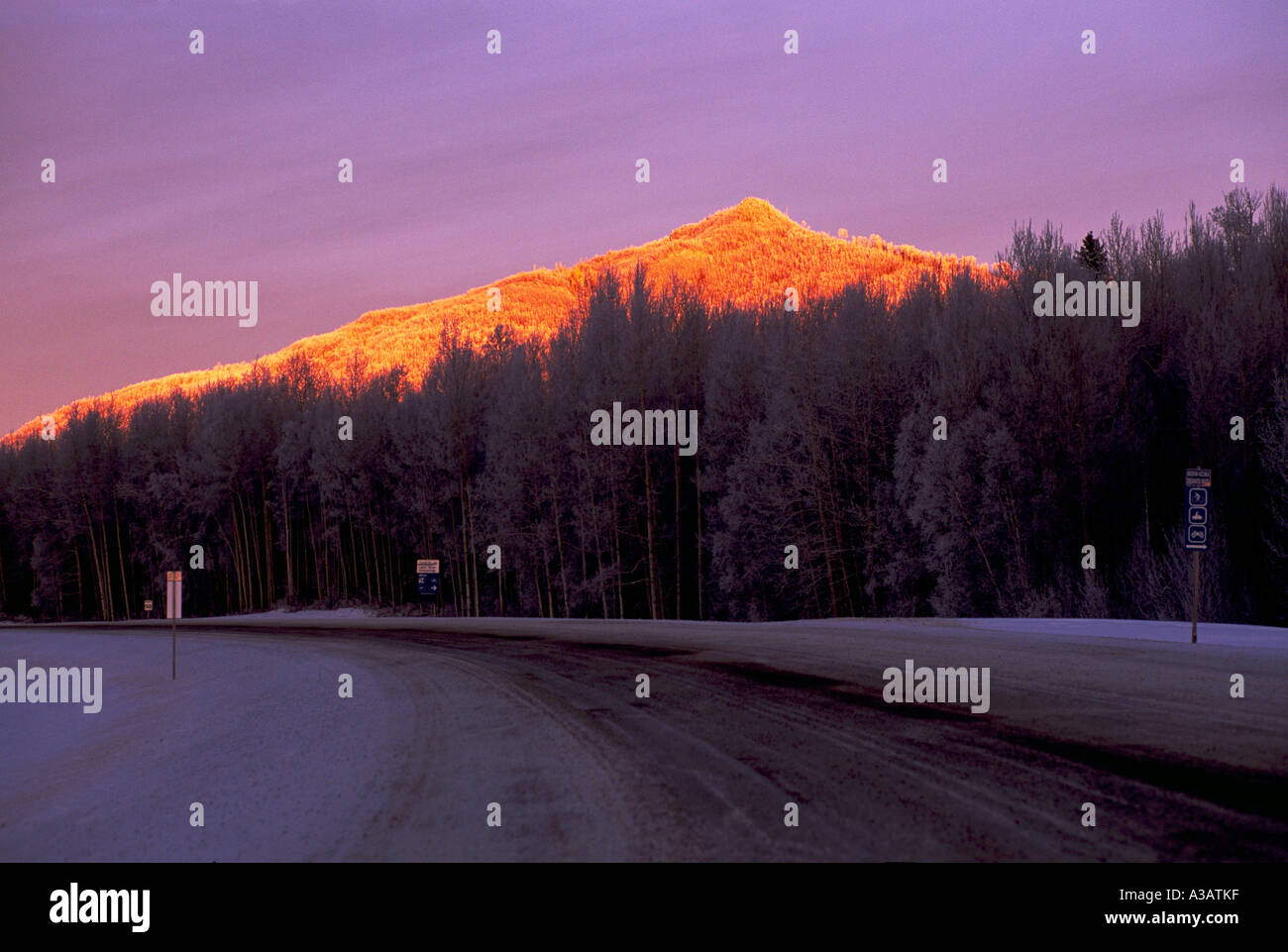 Alaska Highway at Sunrise in Winter, near Liard River Hot Springs ...