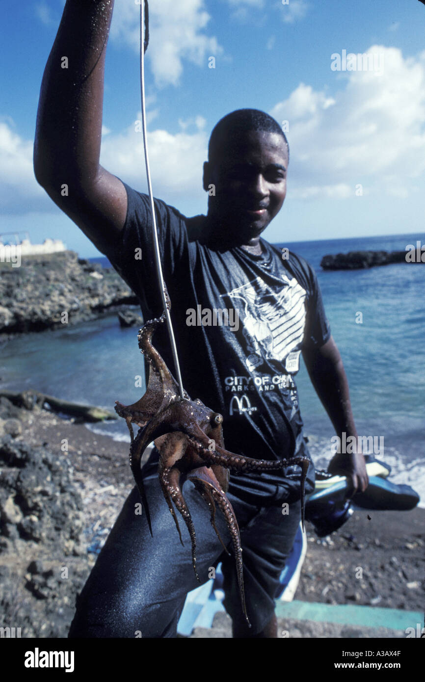 Local fisherman with octopus Dominican Republic explotation overfishing ...