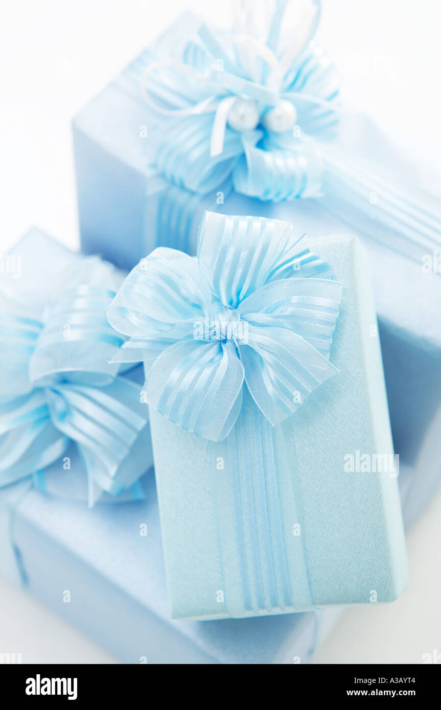 A pile of blue gift boxes in white background Stock Photo - Alamy