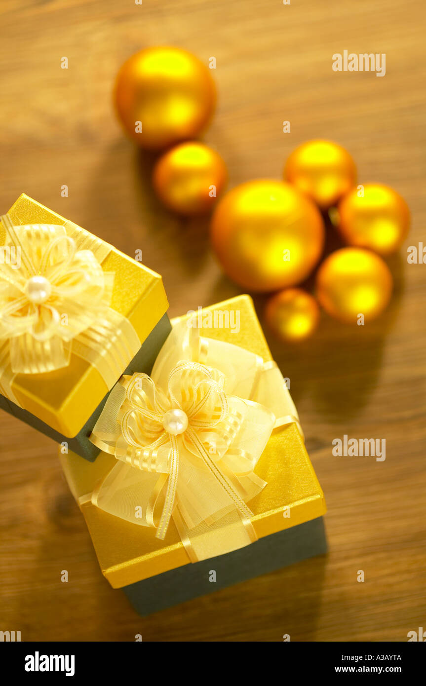 Black gift boxes with golden lids Stock Photo - Alamy