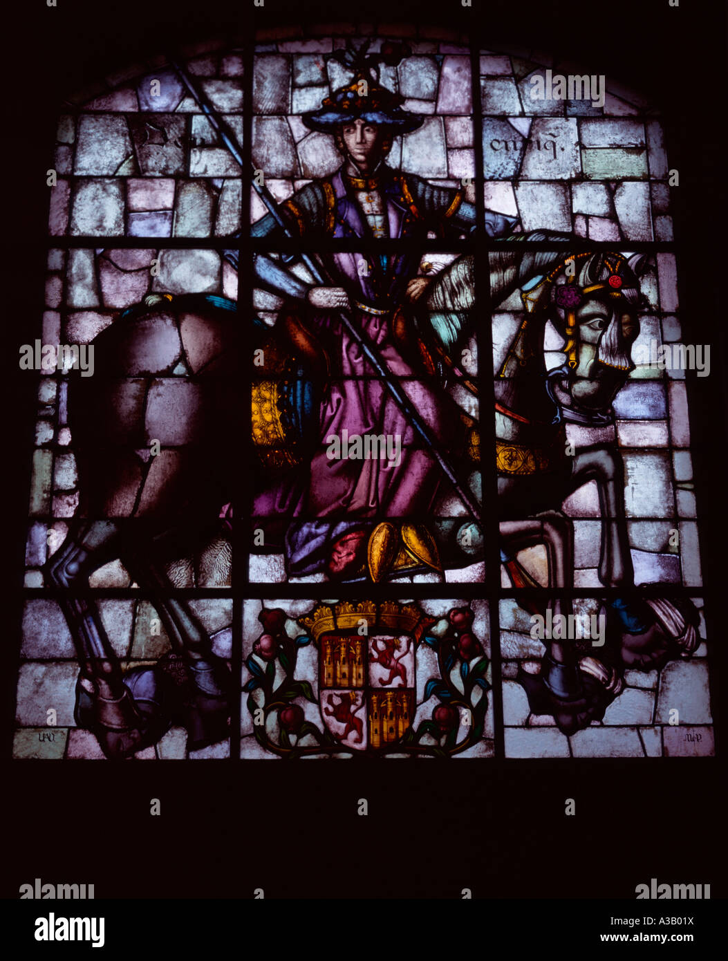 A stained glass window in the Alcazar depicting a medieval knight ...