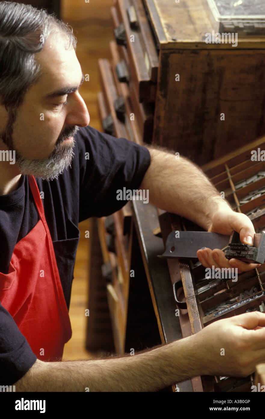 Man setting type by hand Stock Photo - Alamy