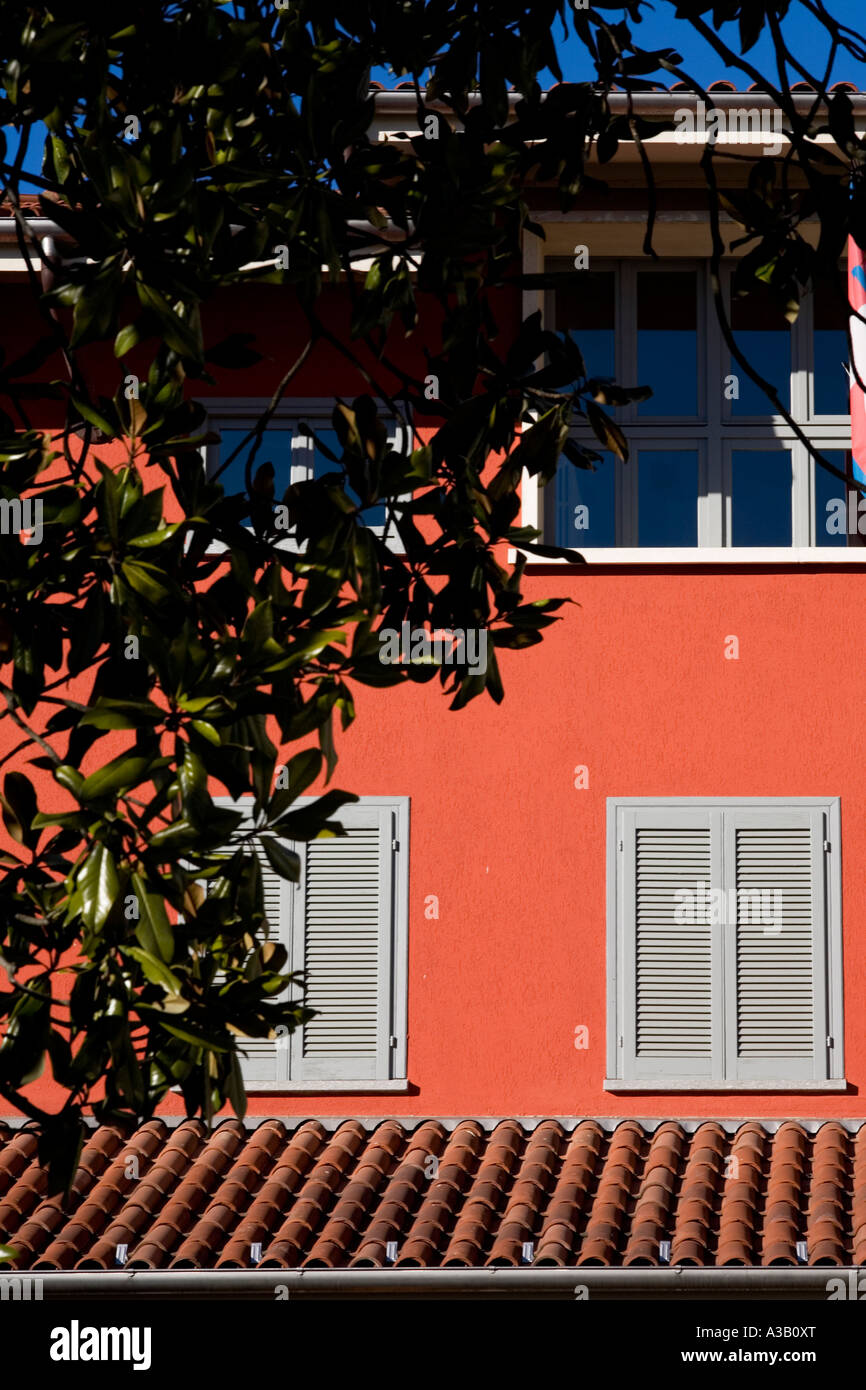 Red North Italian house Stock Photo - Alamy