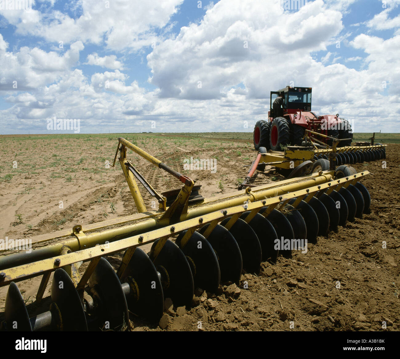 TILLING FALLOW LAND WITH TWO TILLERS Stock Photo - Alamy