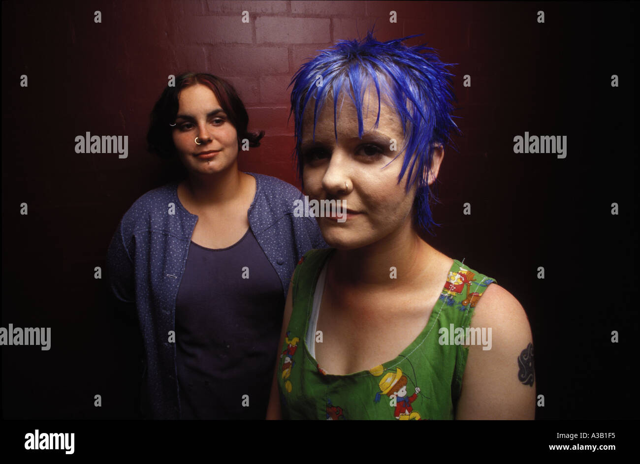 Blue hair punk girl with pierced girlfriend 0425 Stock Photo - Alamy