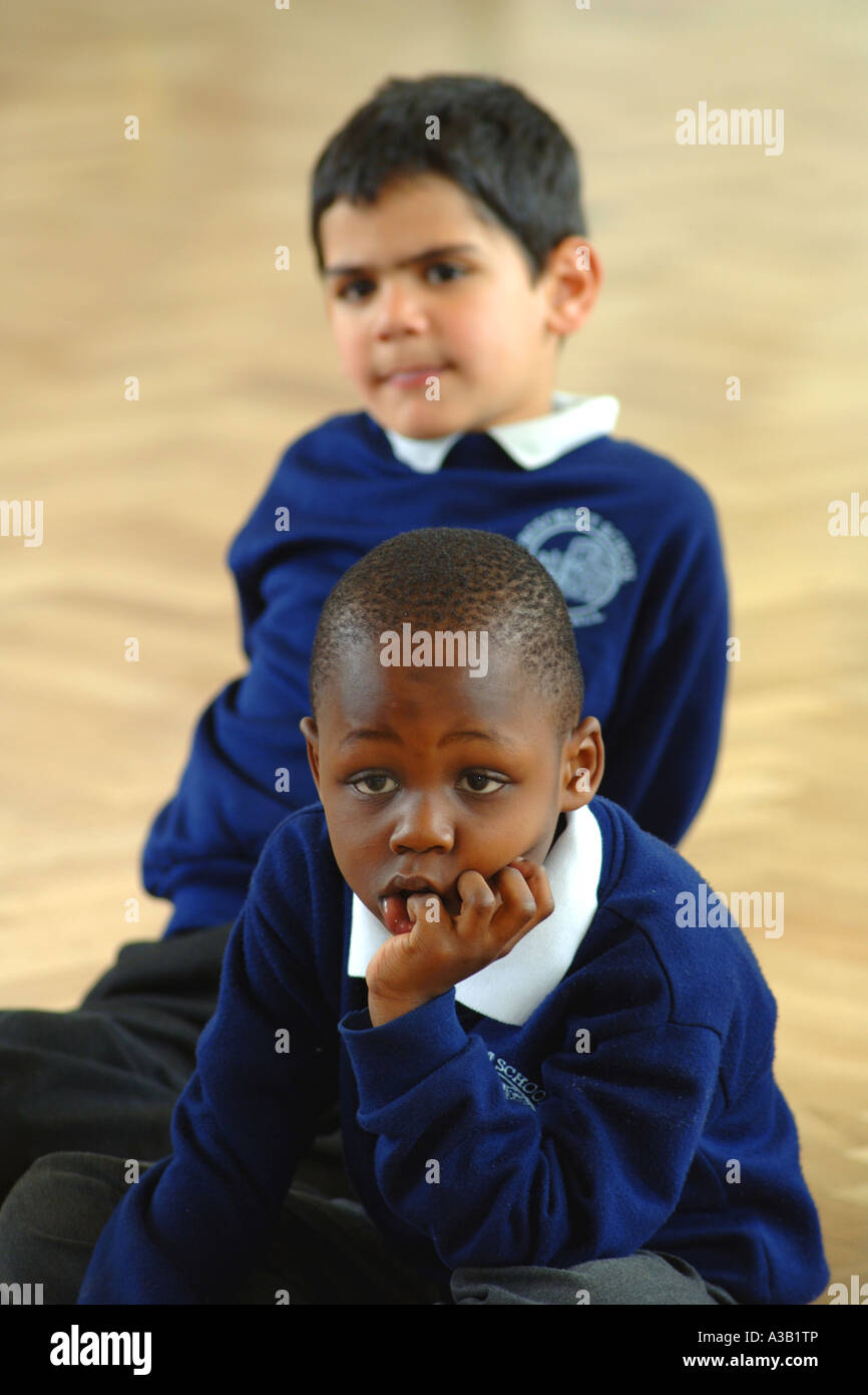 two boys listen to the group discussion at a primary school West ...
