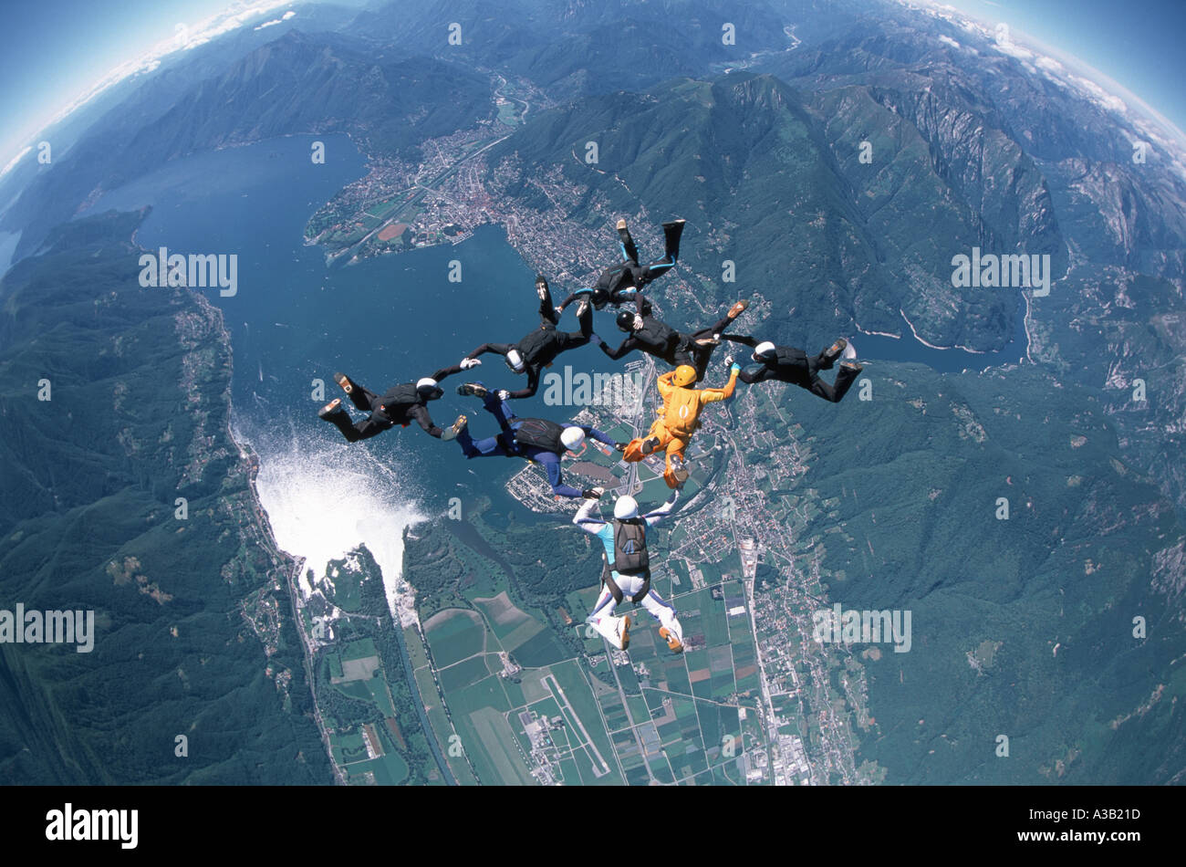 8 way skydiving team in the skies over Locarno Switzerland Stock Photo ...
