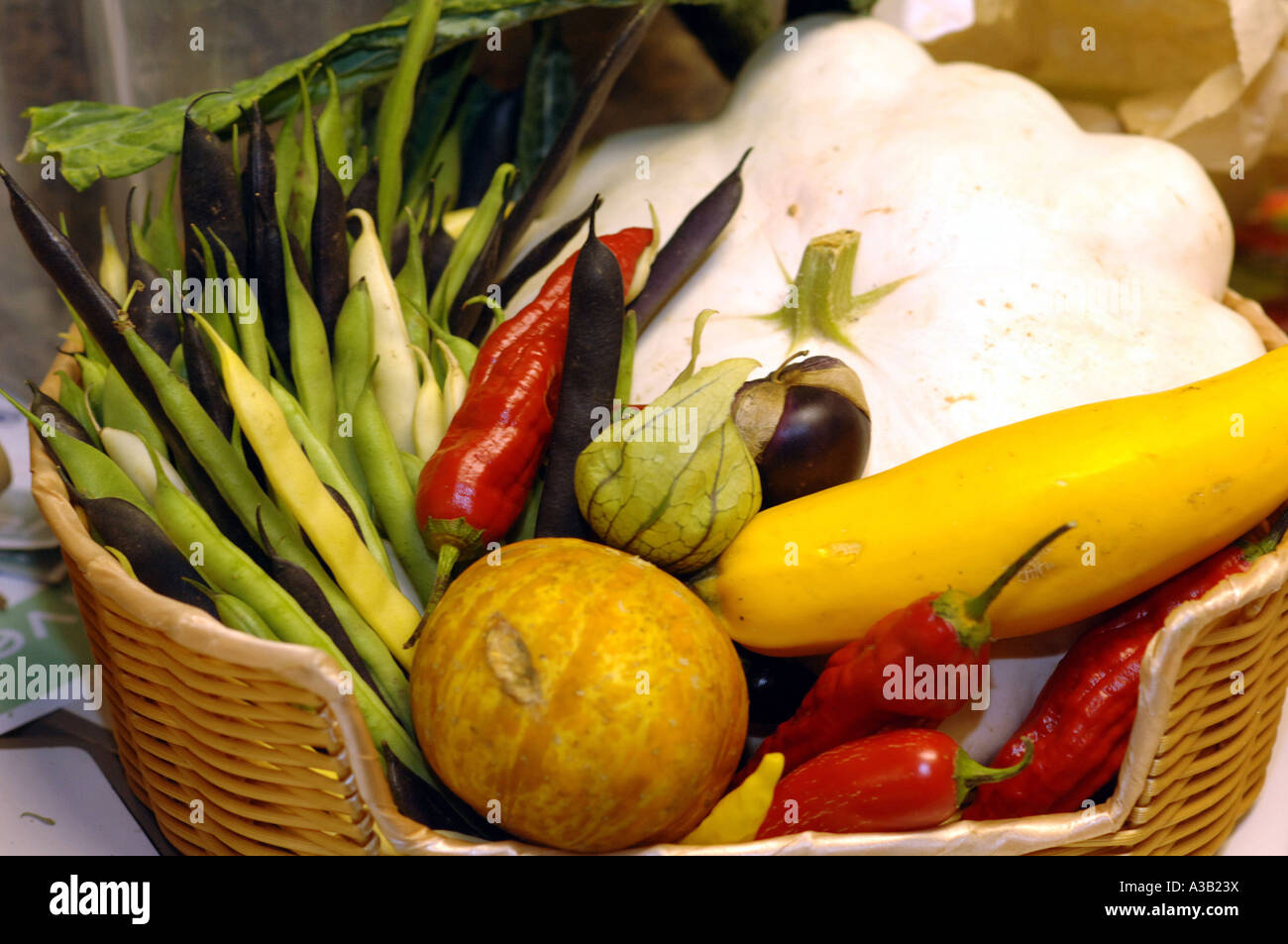 A basket of fresh homegrown organic vegetables on display at a ...