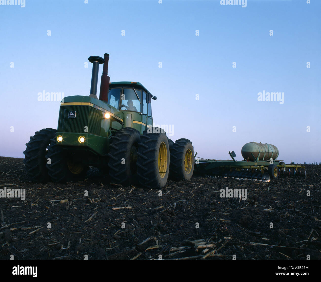 4 WHEEL DRIVE TRACTOR WITH DISC AND CHEMICAL TANKS / IOWA Stock Photo ...