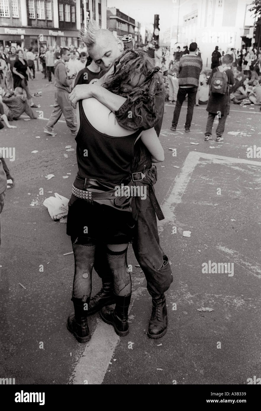 Punk couple kissing during a rally in Brixton London England Britain UK ...