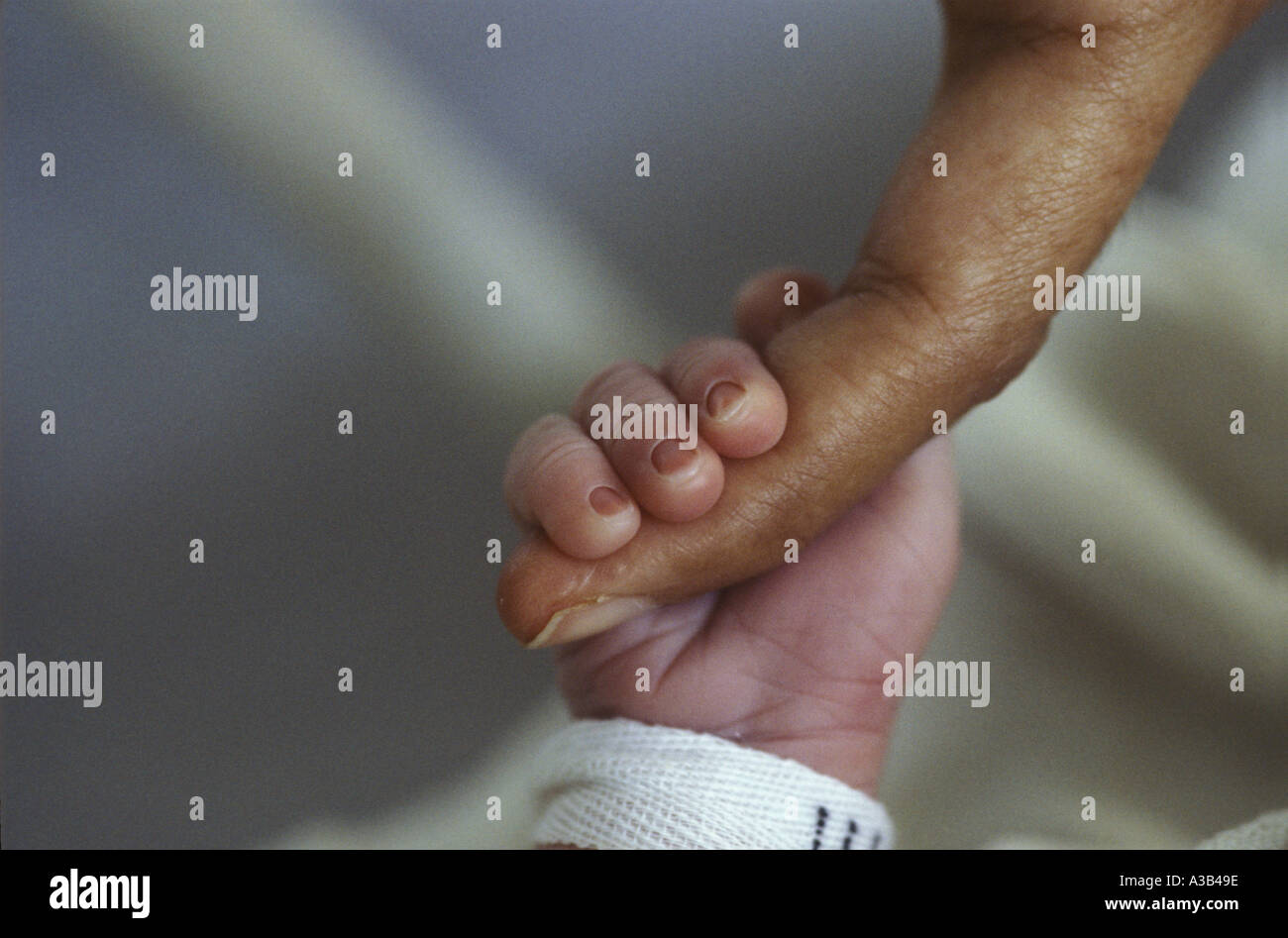 First touch baby with mother Singapore Stock Photo - Alamy