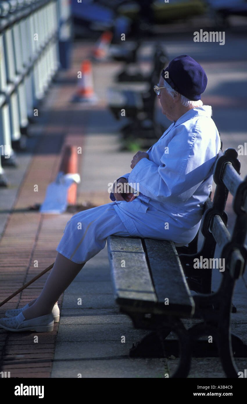 Old Lady Sat on Bench Stock Photo - Alamy