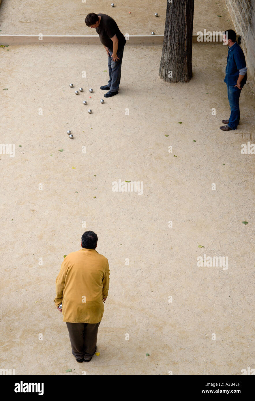 FRANCE Ile de France Paris Three men playing traditional French ball ...