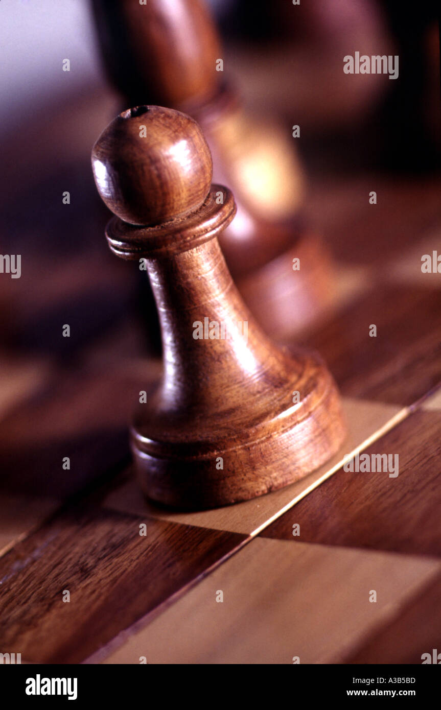 Pawn on a chess board Stock Photo - Alamy