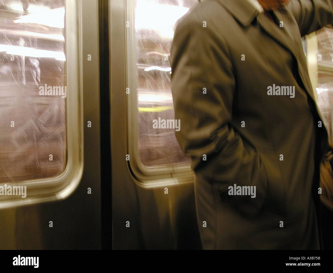 Businessman riding subway train hi-res stock photography and images - Alamy