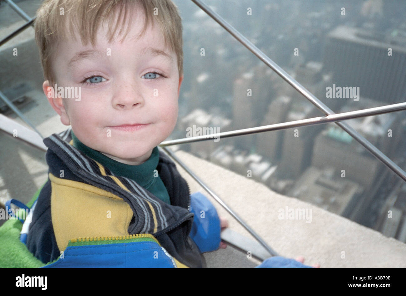 Five year old boy on top of the Empire State Building New York City USA ...