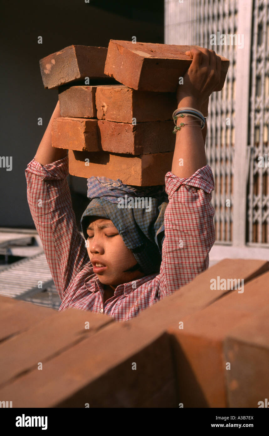 Construction worker carrying bricks hi-res stock photography and images ...