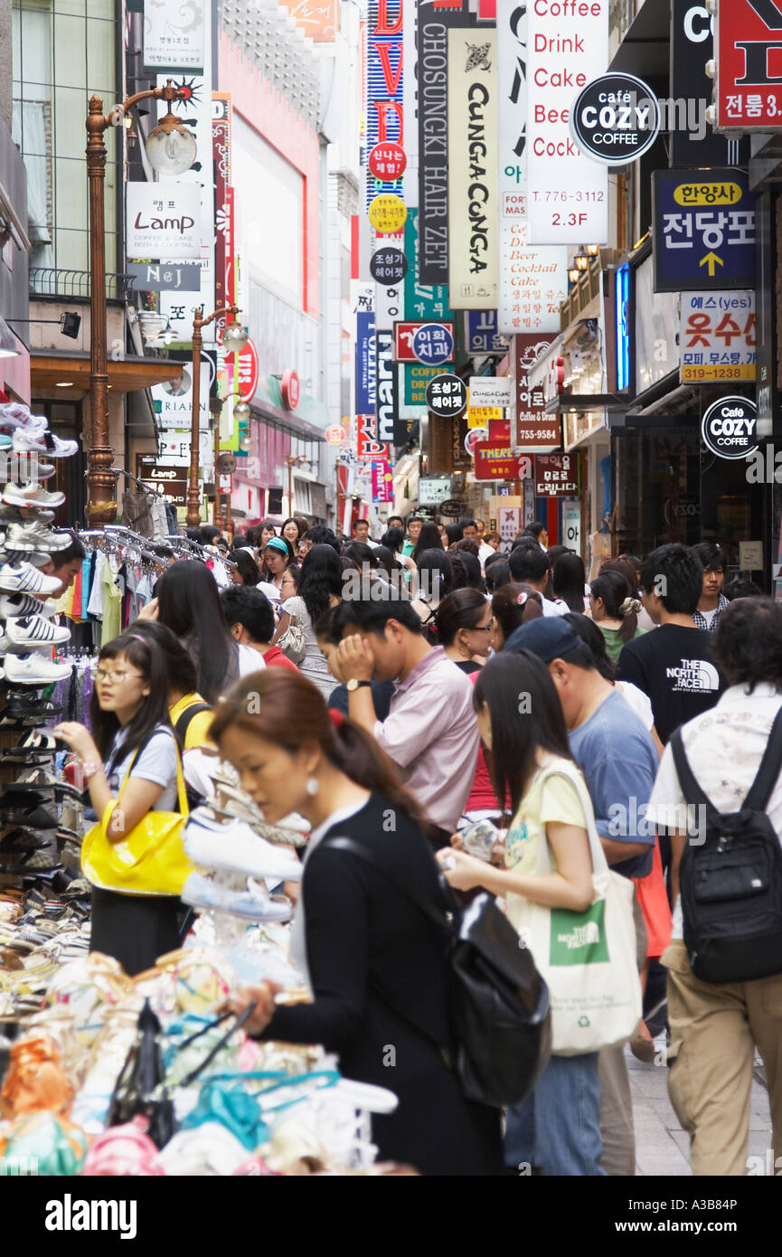 Shoppers In Busy Street Stock Photo - Alamy