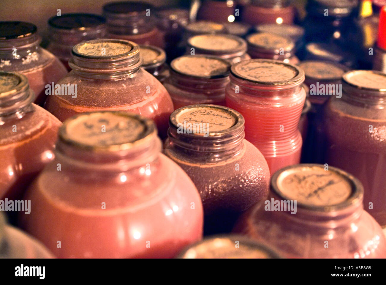 mason jars of preserves gathering dust Stock Photo - Alamy