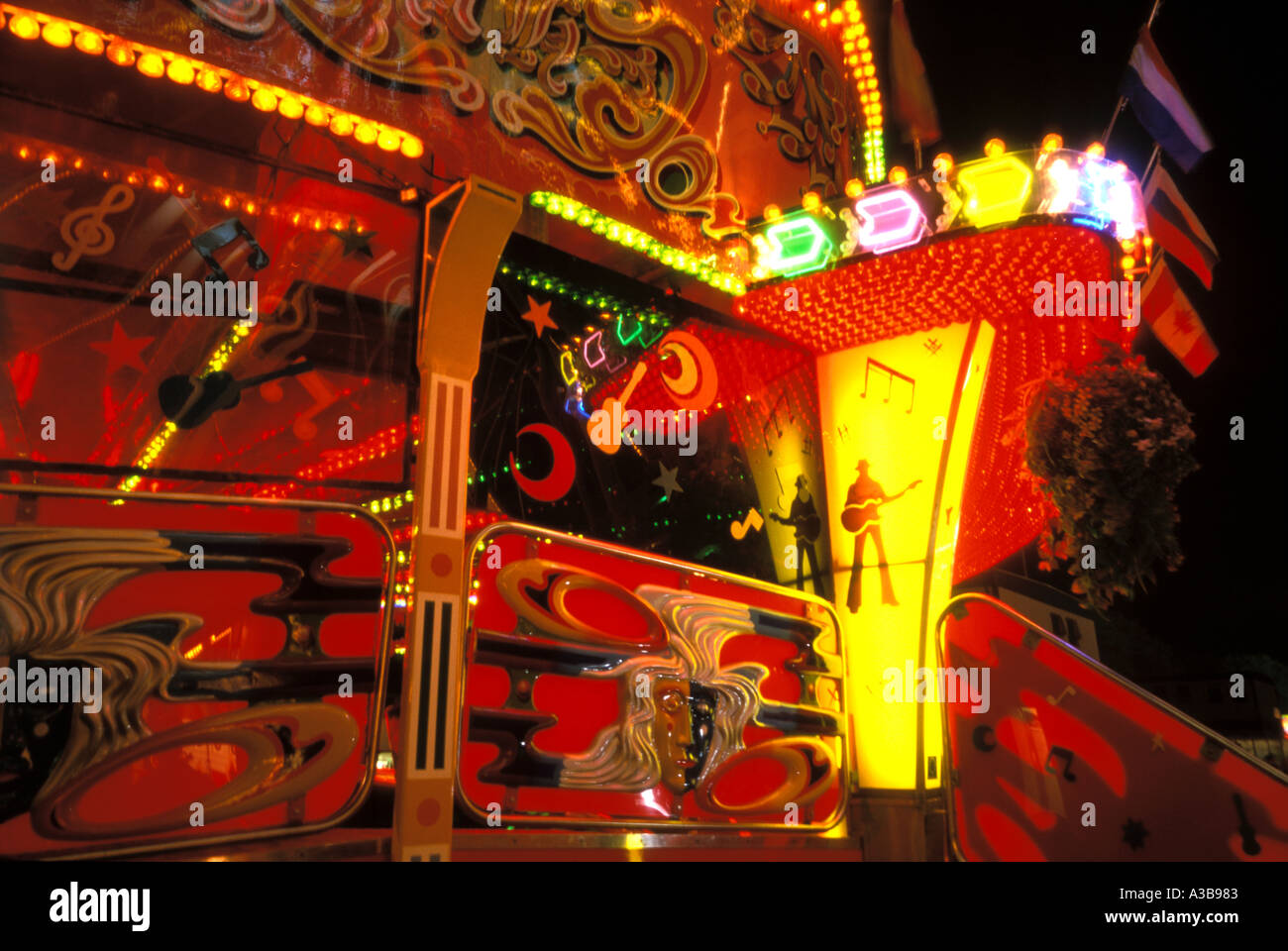 Detail of fairground ride at night Stock Photo - Alamy
