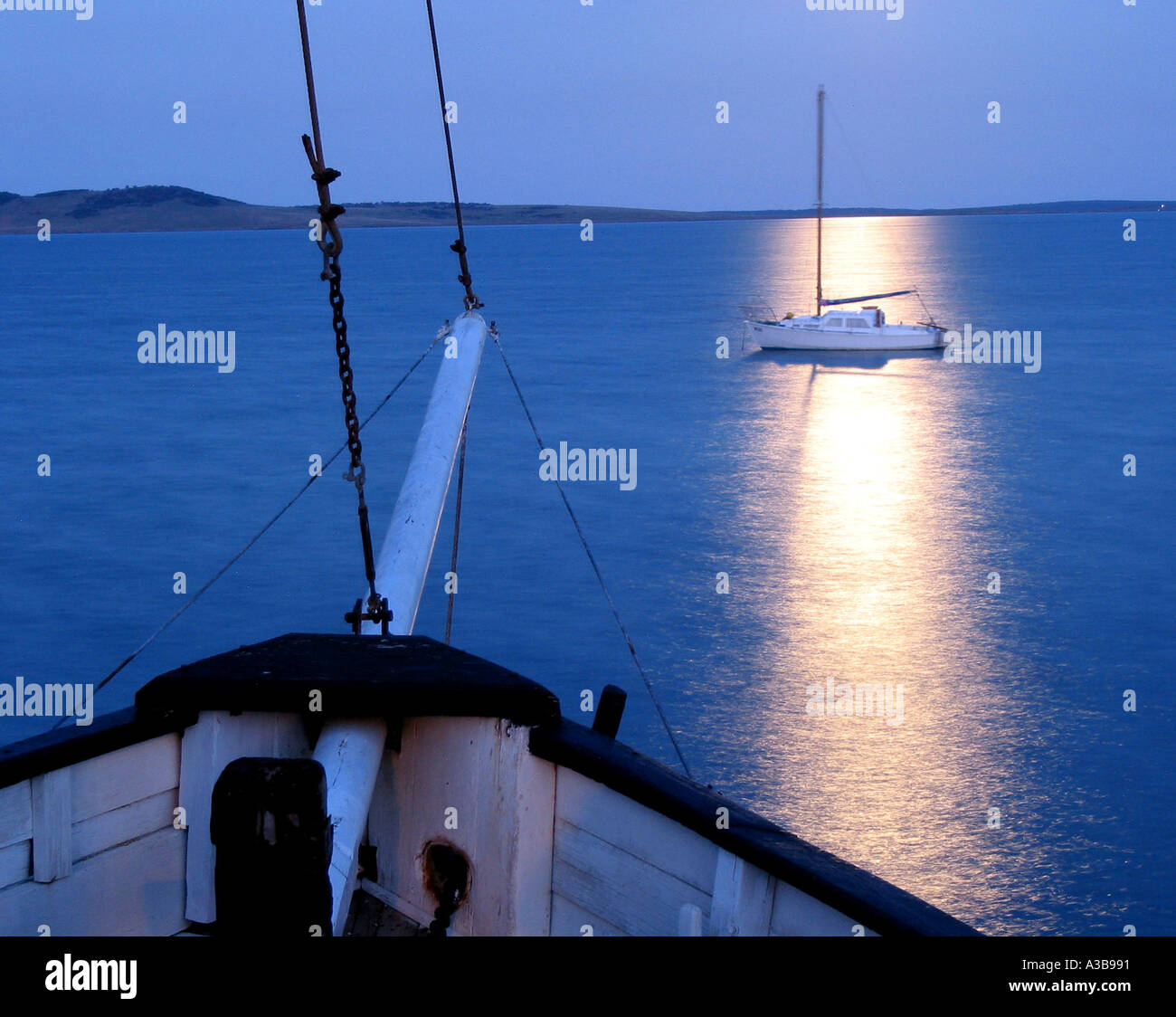 Shadow of moon over water Stock Photo - Alamy