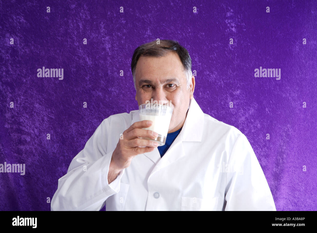 physician, man with glass of milk Stock Photo - Alamy