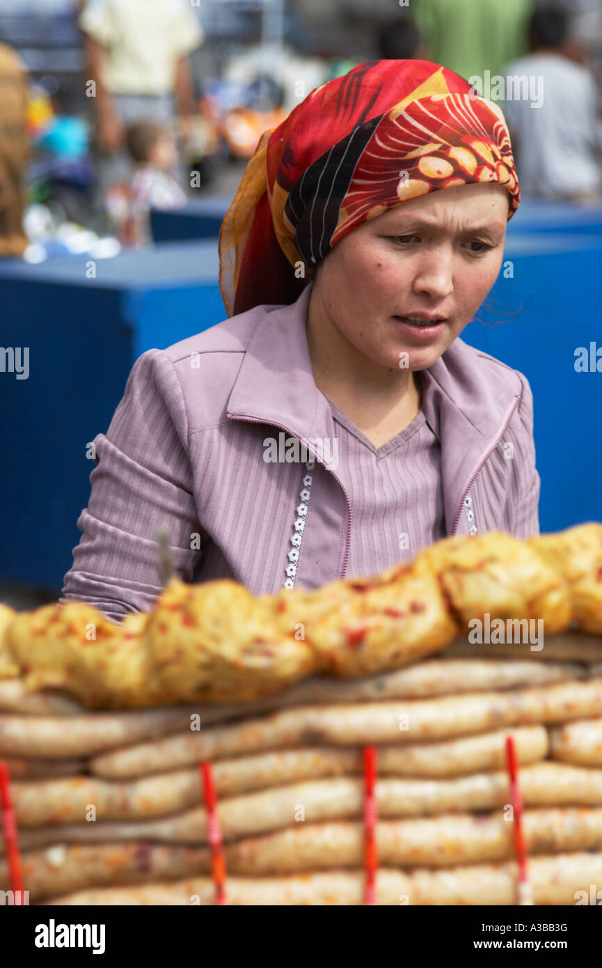 Woman standing outside bakery hi-res stock photography and images - Alamy