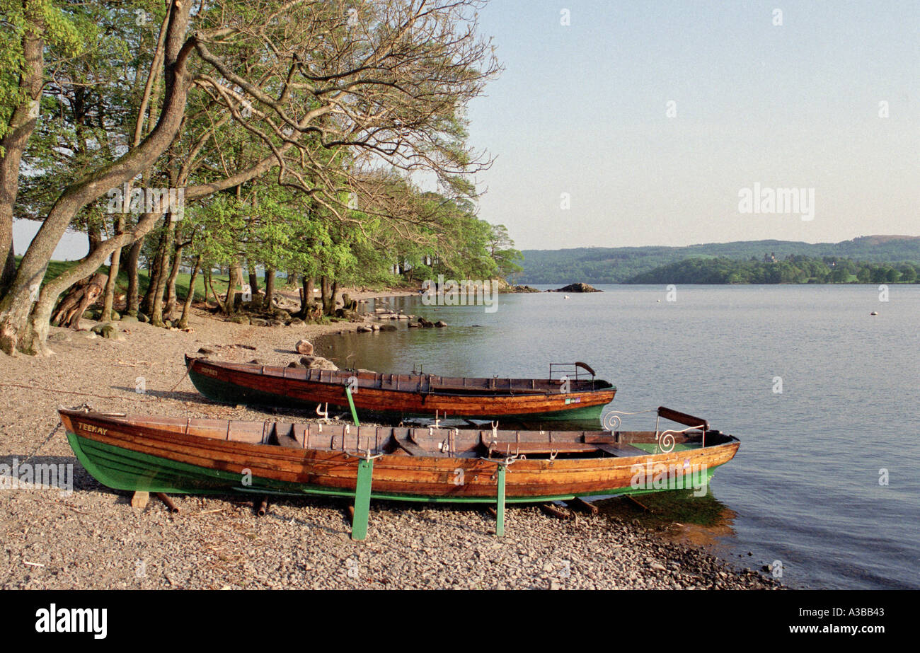 Old rowing boats on shore of Lake Windermere Lake District Stock Photo ...